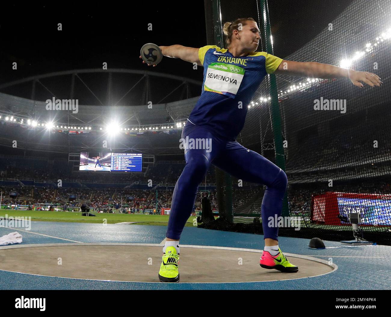 Ukraine's Natalia Semenova makes an attempt in the women's discus ...