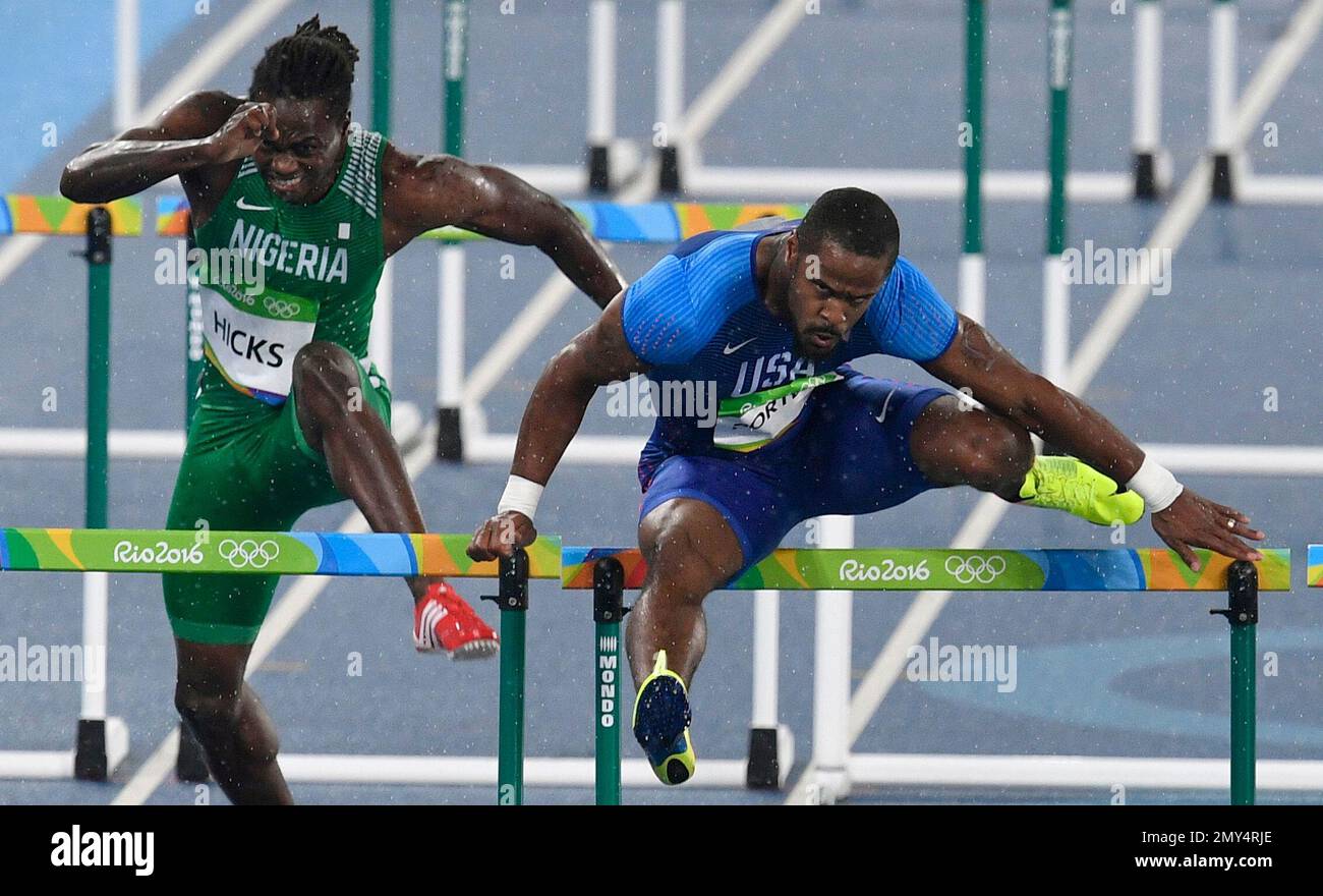 United States' Jeff Porter, right, and Nigeria's Antwon Hicks compete ...
