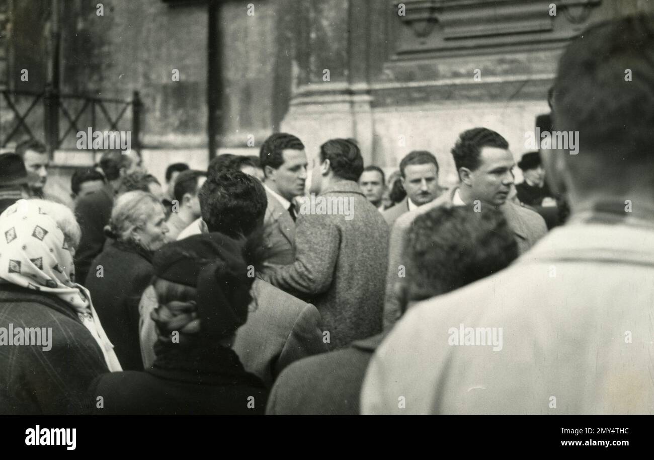 Traditional Italian catholic church funeral with wagon, procession and ...
