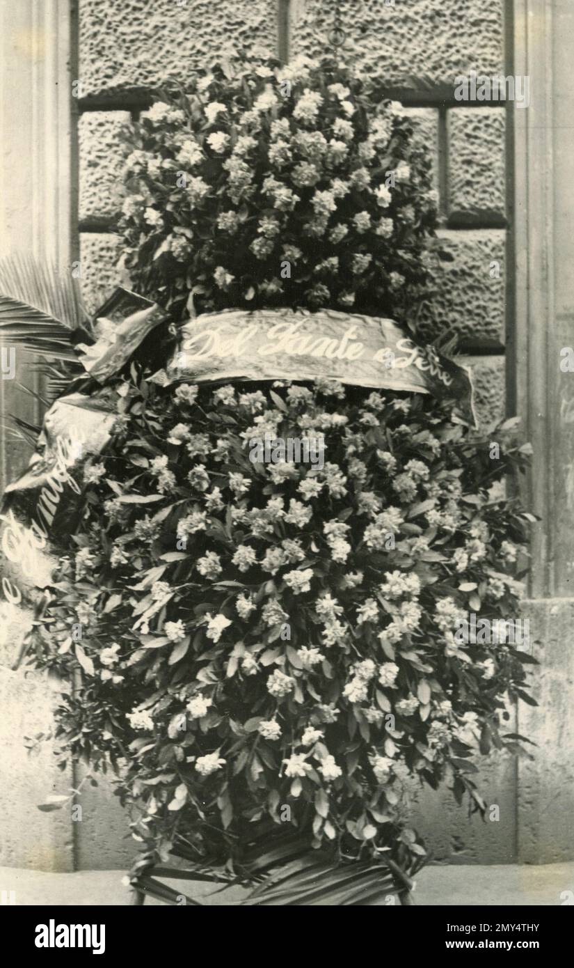 Traditional Italian catholic church funeral with wagon, procession and ...