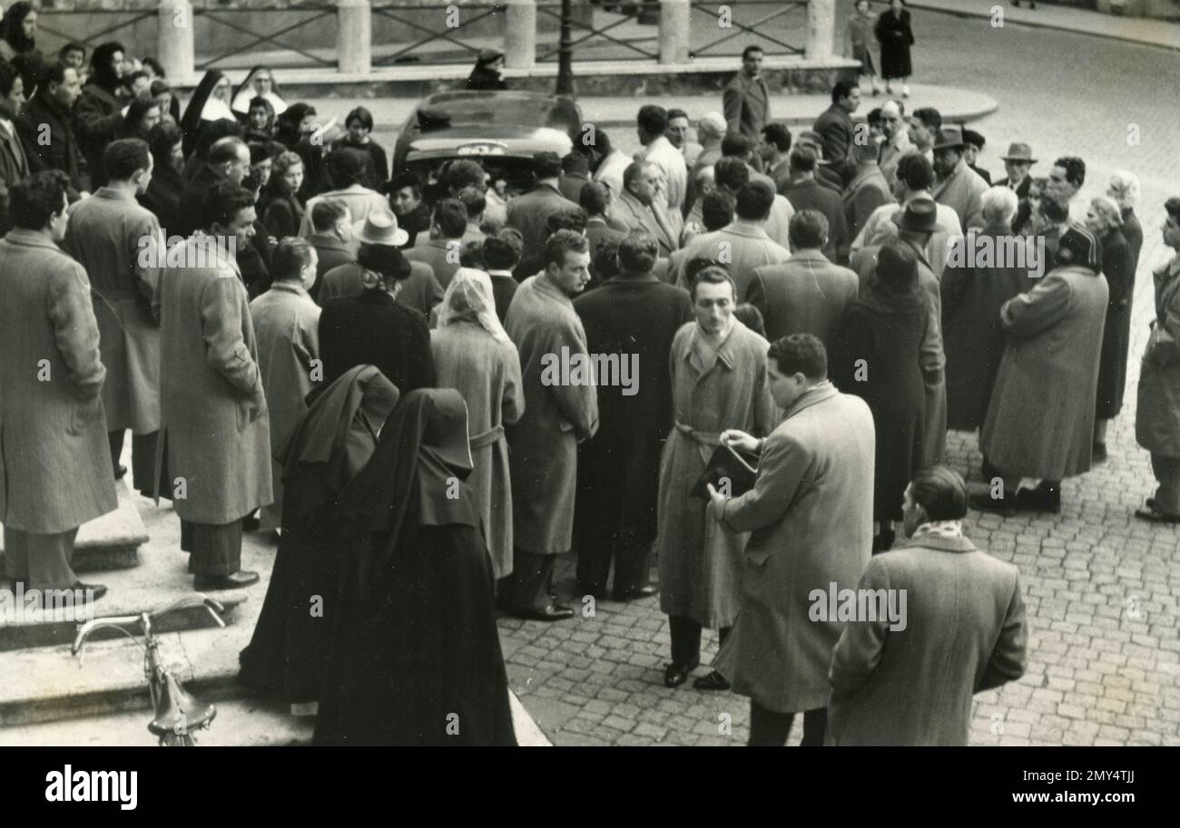 Traditional Italian catholic church funeral with wagon, procession and ...