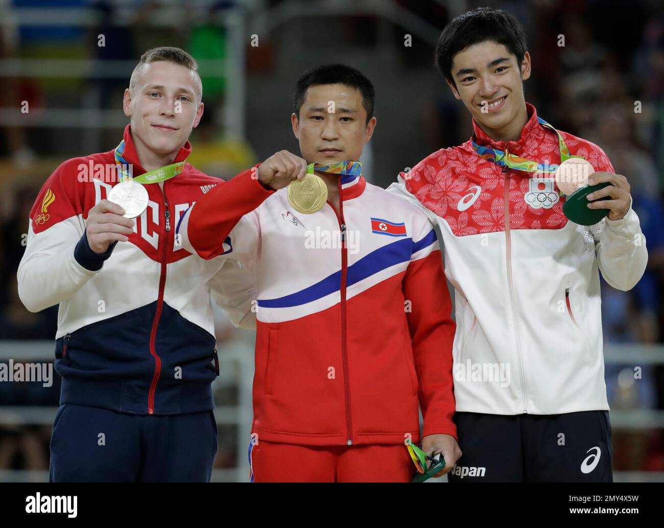 From left to right, Russia's Denis Abliazin, silver, North Korea's Ri ...