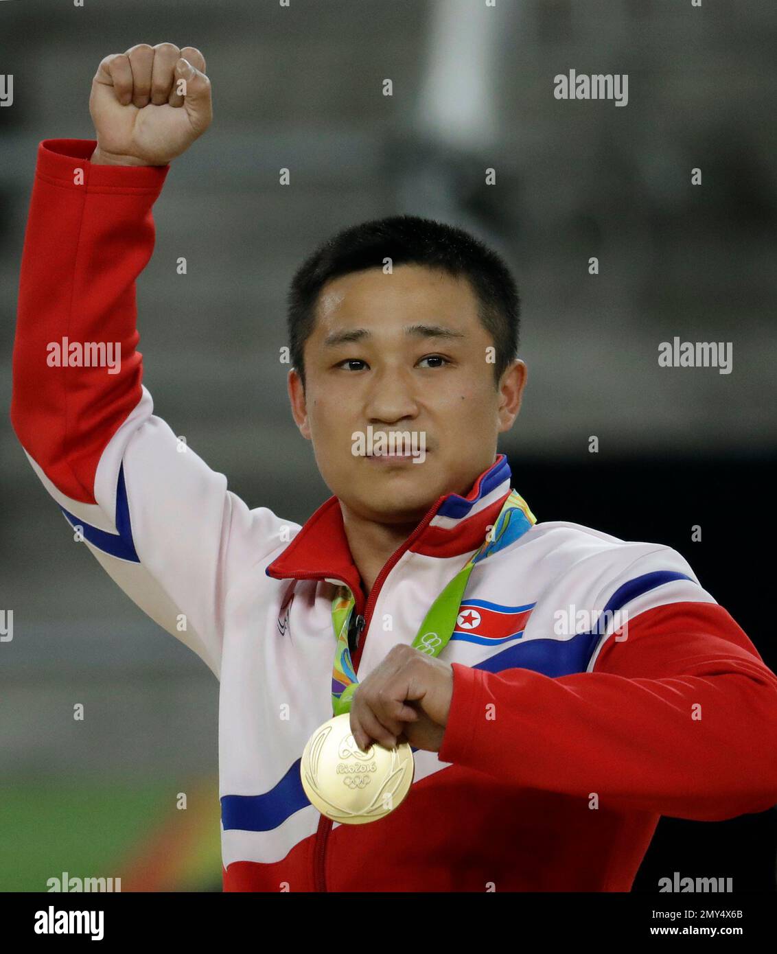 North Korea's Ri Se Gwang celebrates after receiving his gold medal for ...