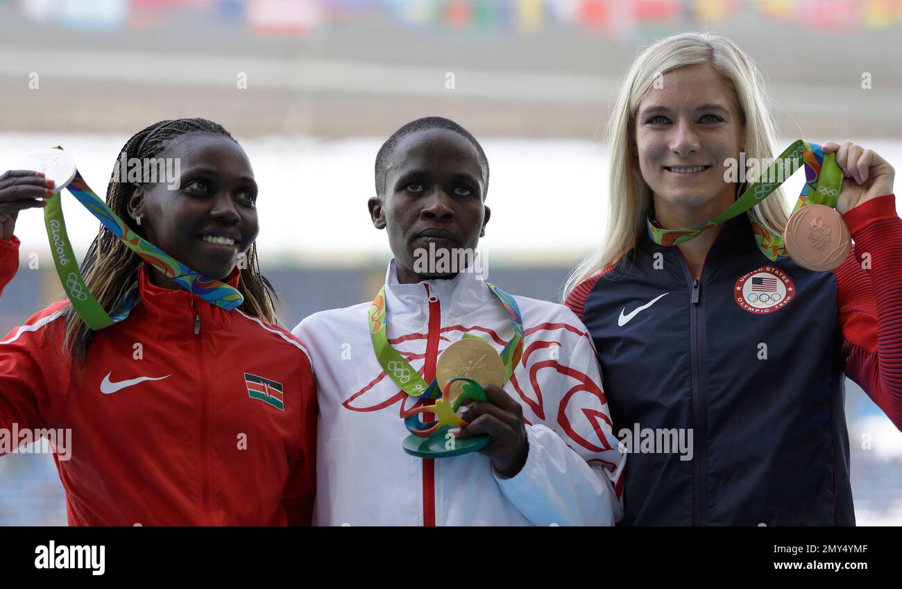 Bahrain's gold medal winner Ruth Jebet is flanked by Kenya's silver ...