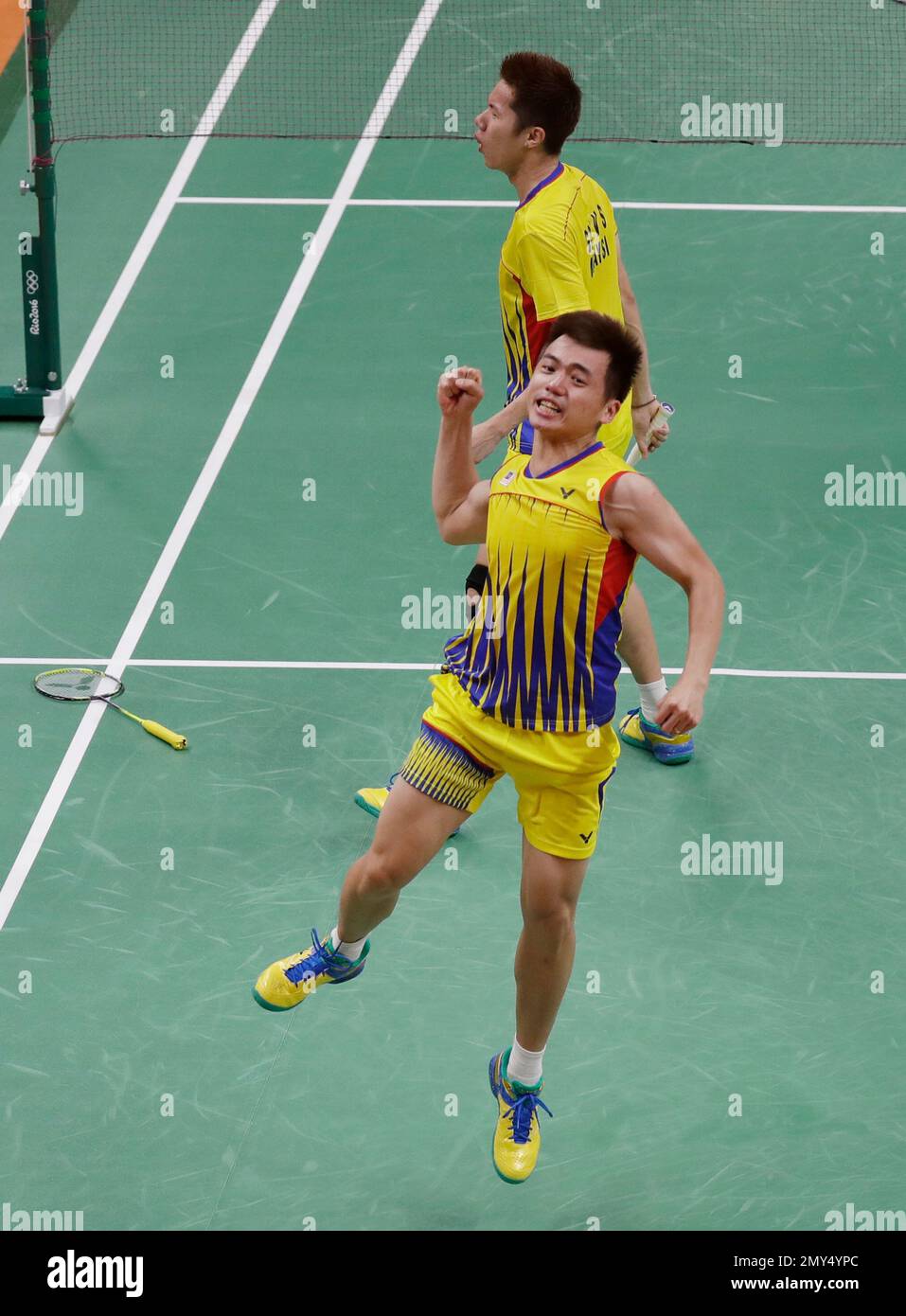 Malaysia's Tan Wee Kiong, front, and Goh V Shem celebrate after beating ...