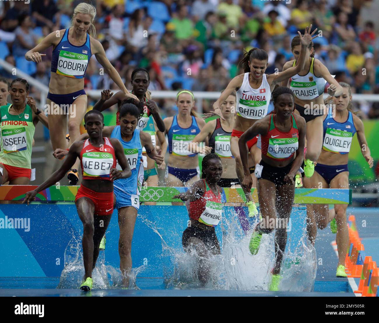 Bahrain's Ruth Jebet, left, competes in the women's 3000-meter ...