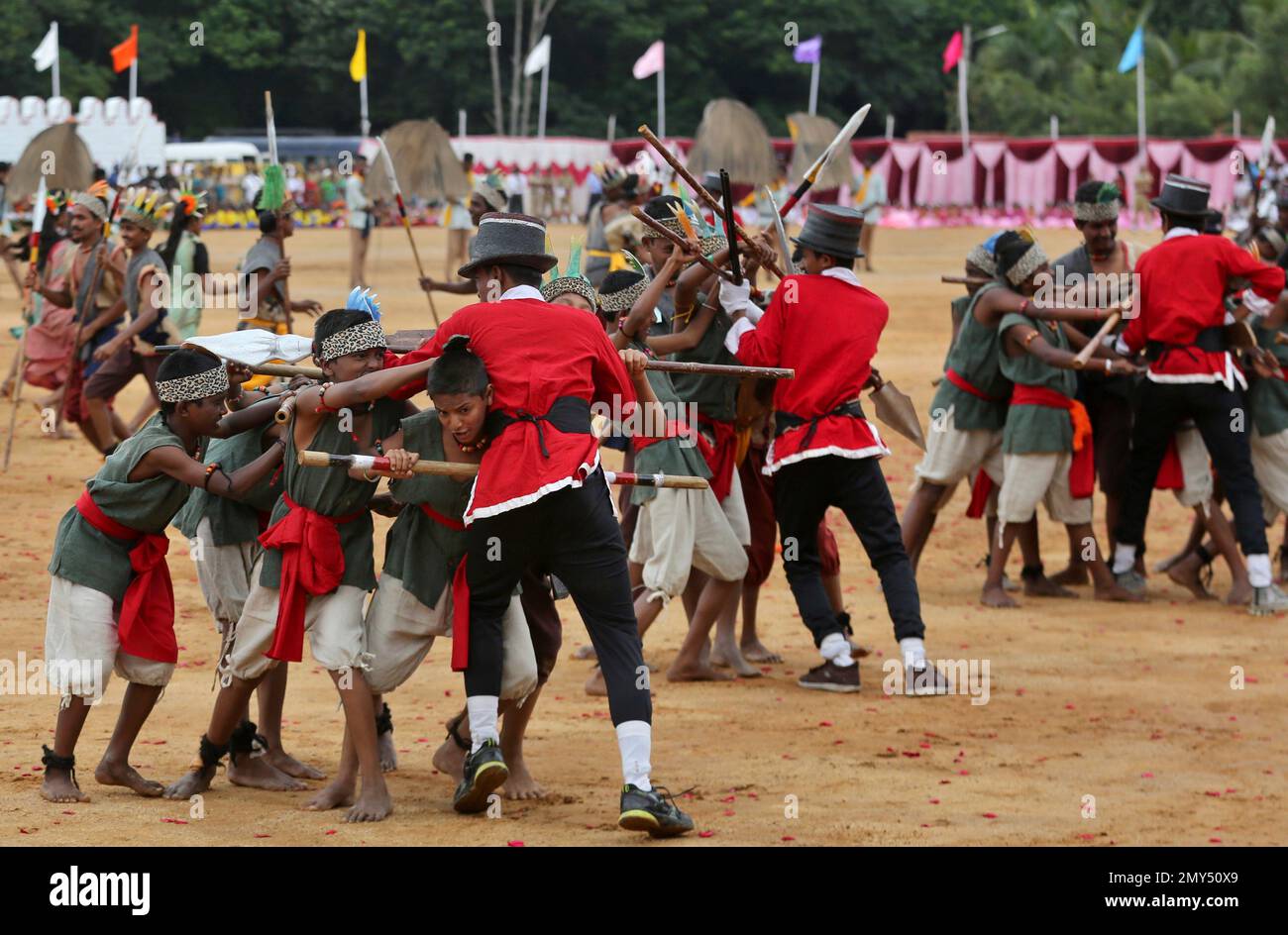 School children enact a scene of India's pre-independence era during ...