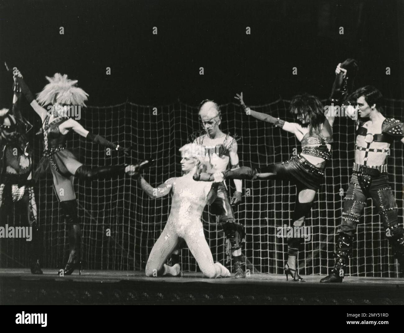 Dancer Jonathan Cope (kneeling) dances in a scene from the Wayne ...