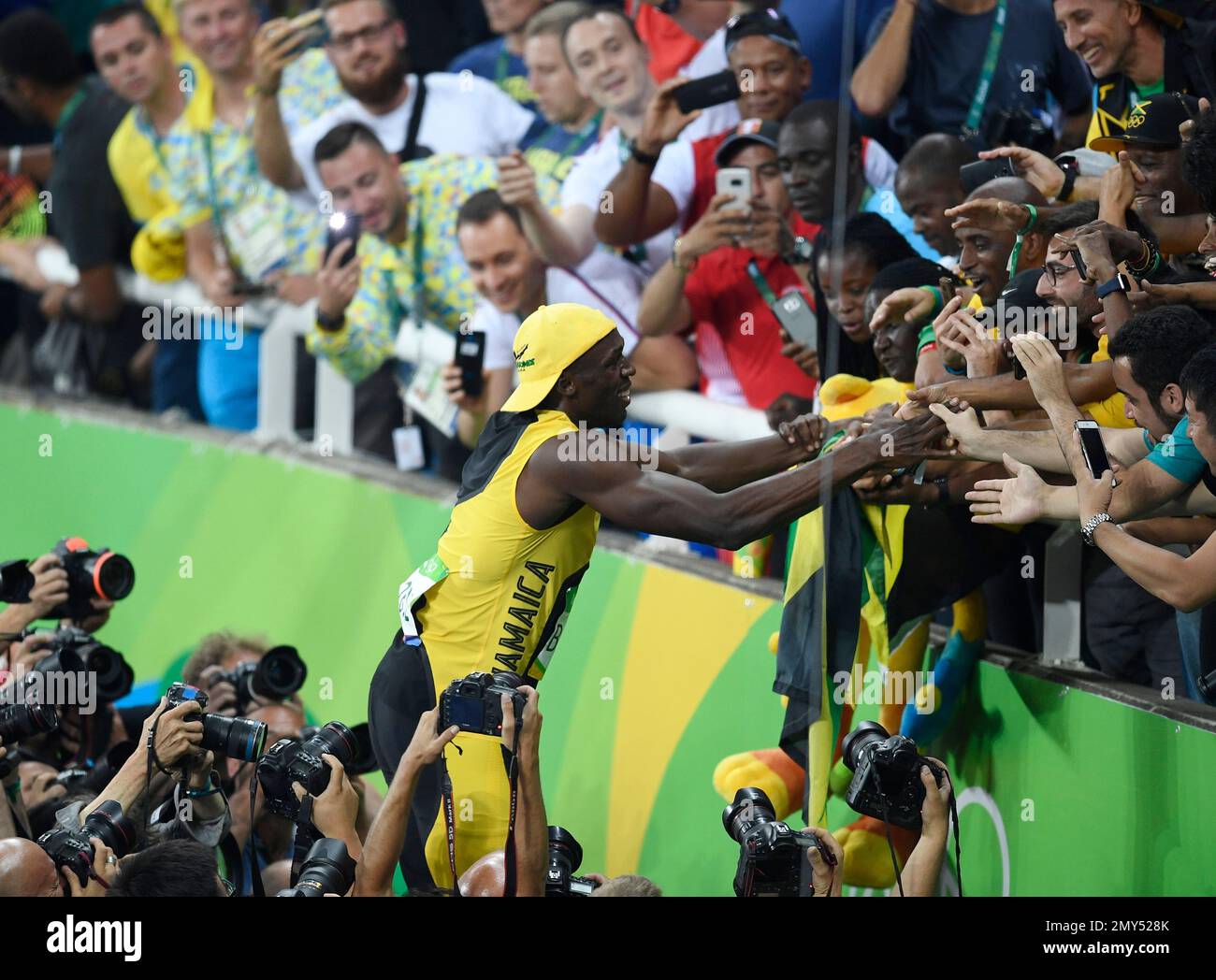 Jamaica's Usain Bolt celebrates winning the men's 100-meter final with ...