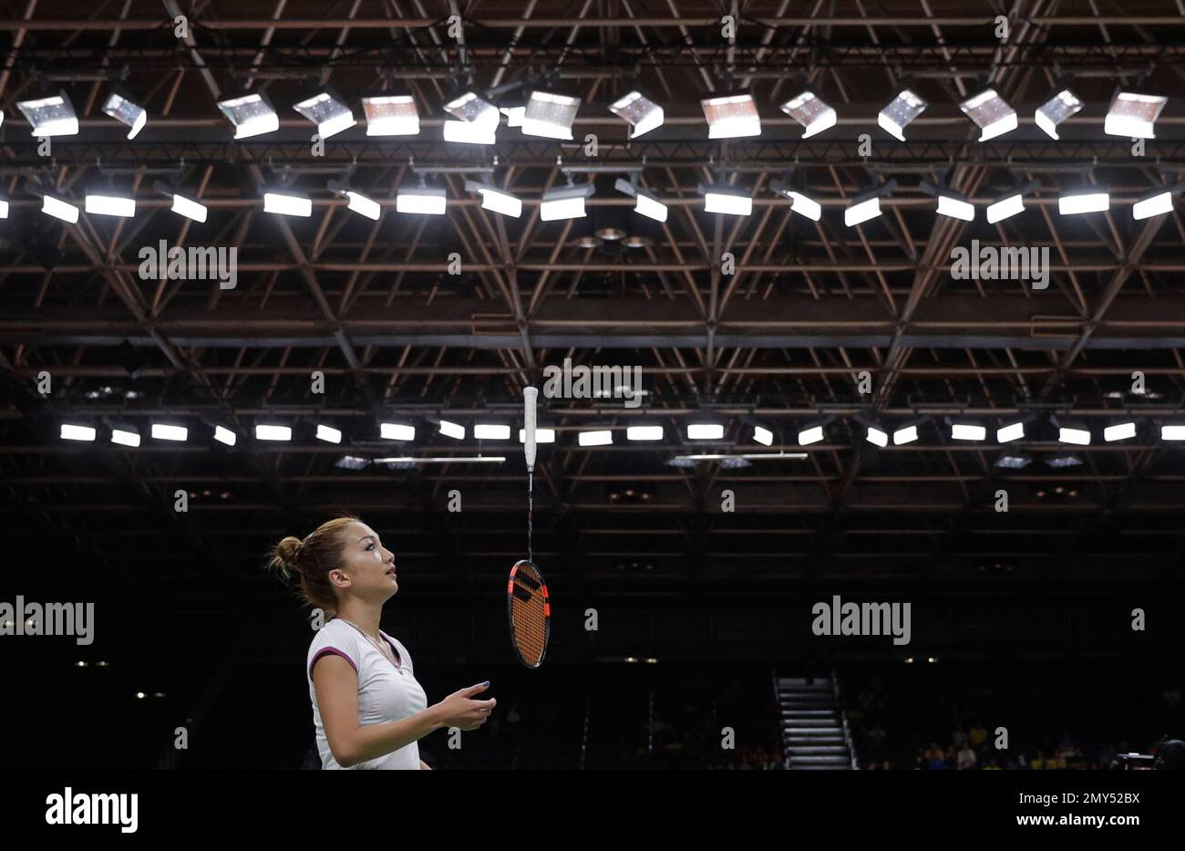 Mauritius' Kate Foo Kune throws her racket after losing a point to ...