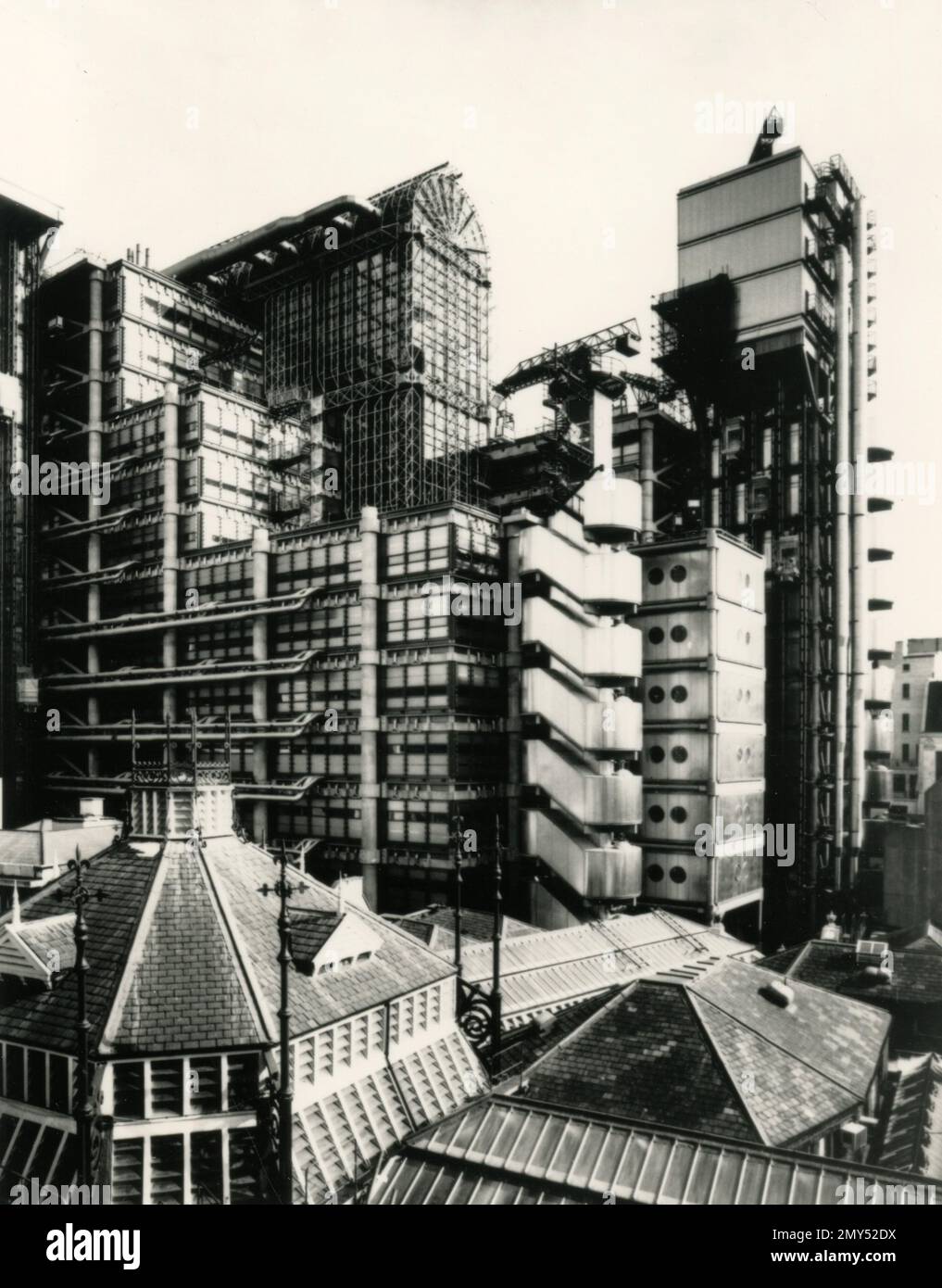 View of the new Lloyd's building across old London rooftops, UK 1980s ...