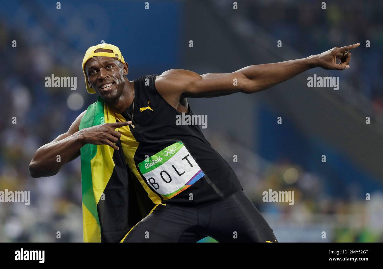 Jamaica's Usain Bolt celebrates winning the men's 100-meter final ...