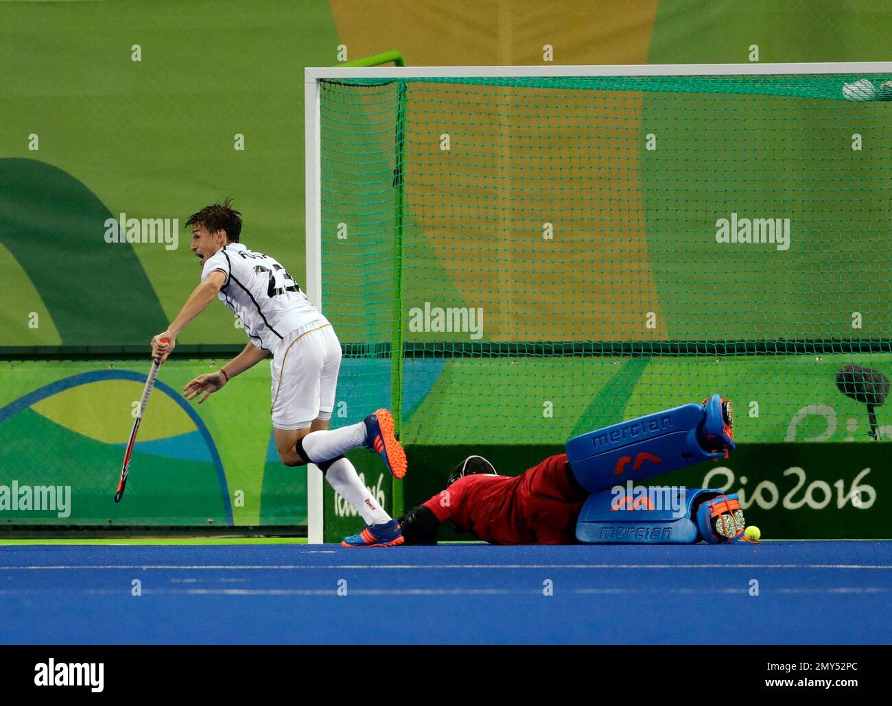 Germany's Florian Fuchs, left, celebrates after he scored his goal ...