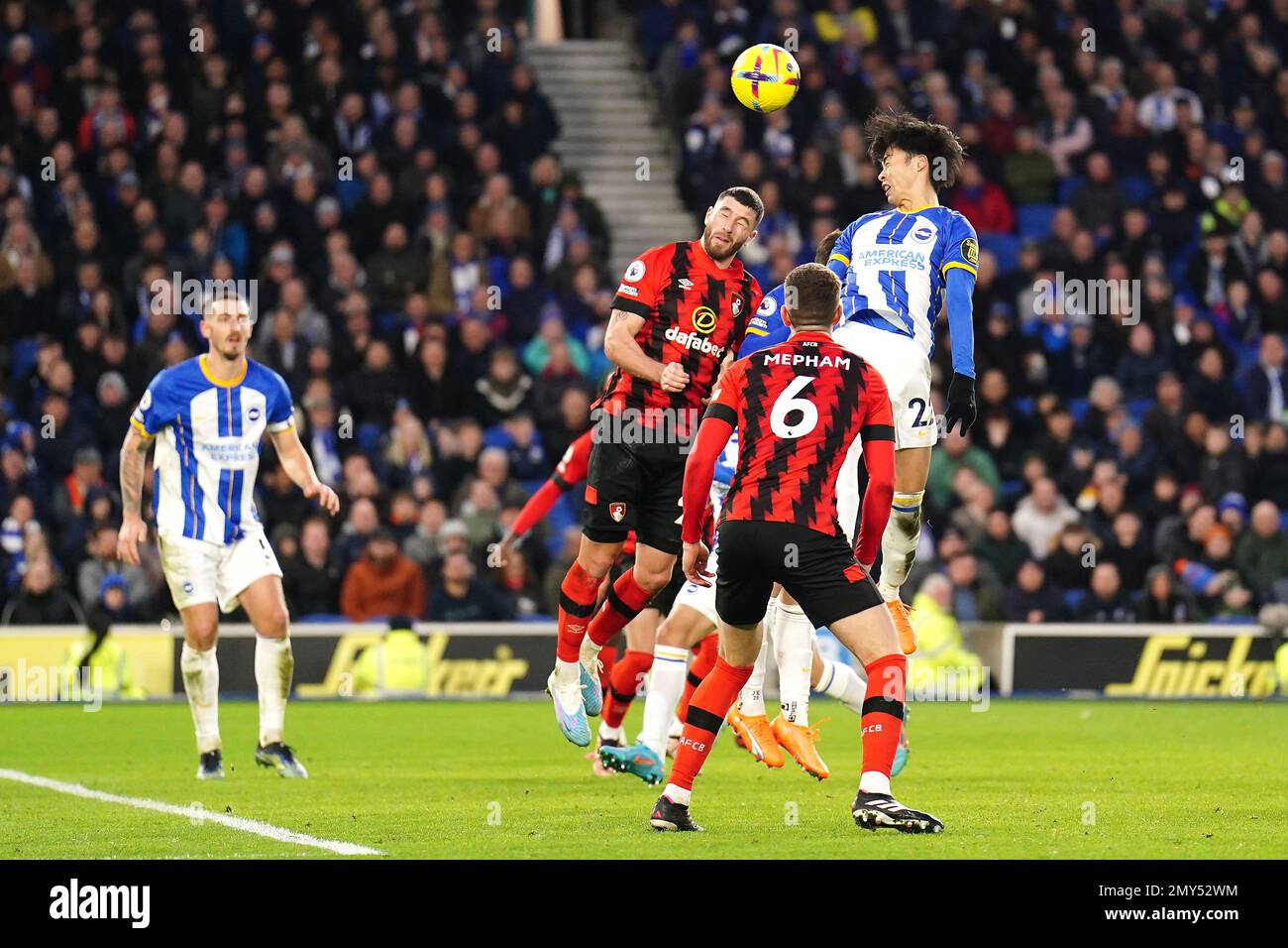 Brighton and Hove Albion's Kaoru Mitoma (right) scores their side's ...