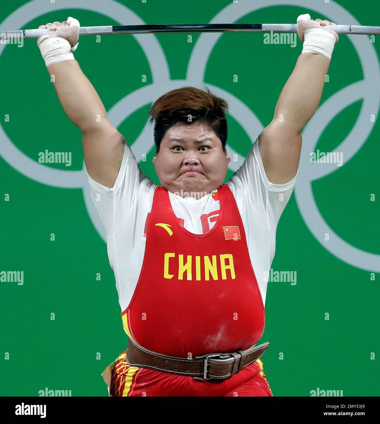 Meng Suping, of China, executes a successful lift in her final attempt ...