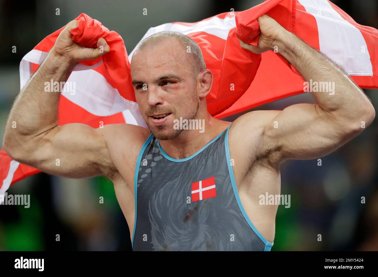 Mark Overgaard Madsen, of Denmark, celebrates his silver medal victory ...