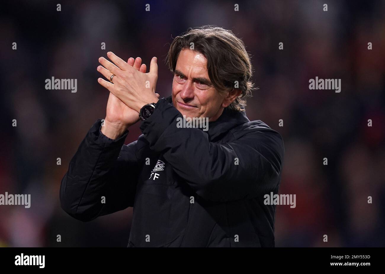 Brentford manager Thomas Frank applauds the fans after the Premier ...