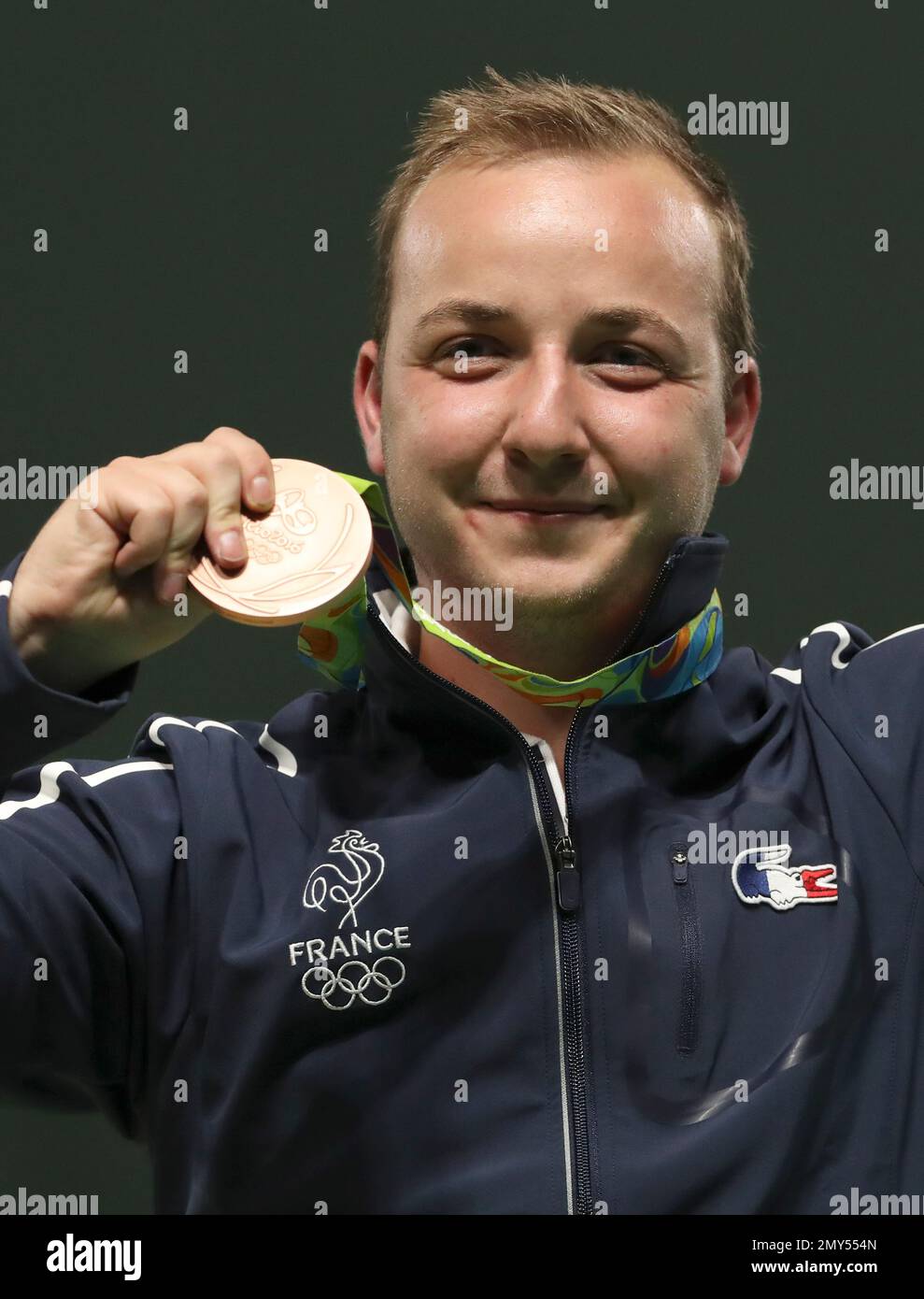 Alexis Raynaud of France celebrates his bronze medal during the award ...
