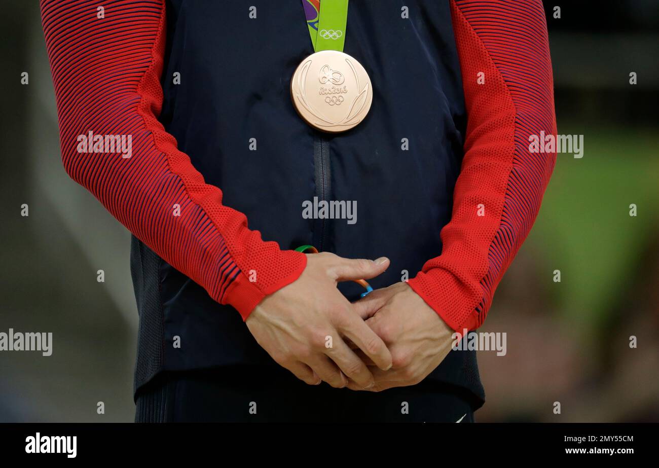 United States' Alexander Naddour, bronze, stands during the medal ...