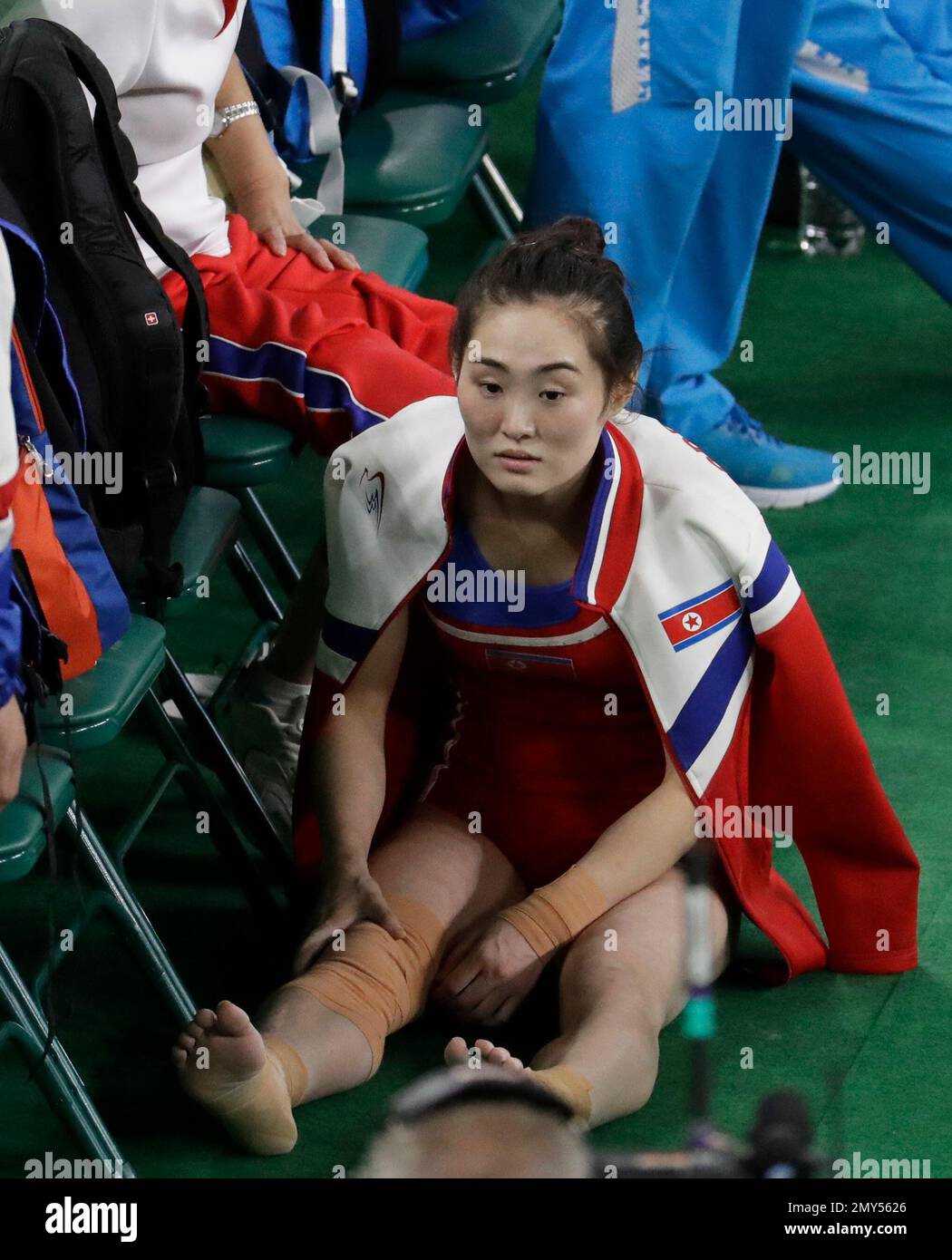 North Korea's Hong Un Jong rests after her vault performance during the ...