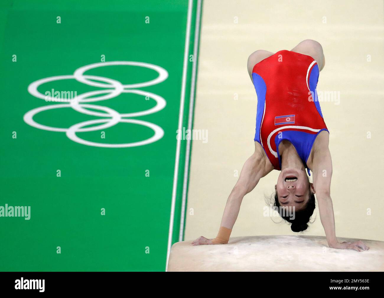 North Korea's Hong Un Jong performs on the vault during the artistic ...