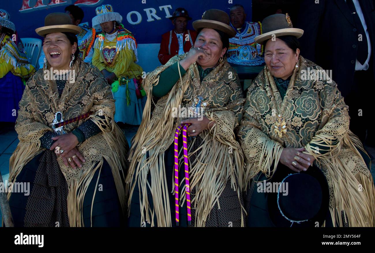 Women smile before the start of the traditional "Fiesta de la Virgen de ...
