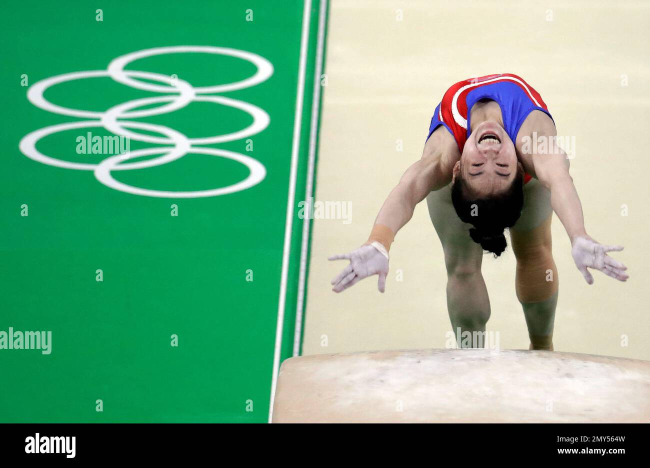 North Korea's Hong Un Jong performs on the vault during the artistic ...