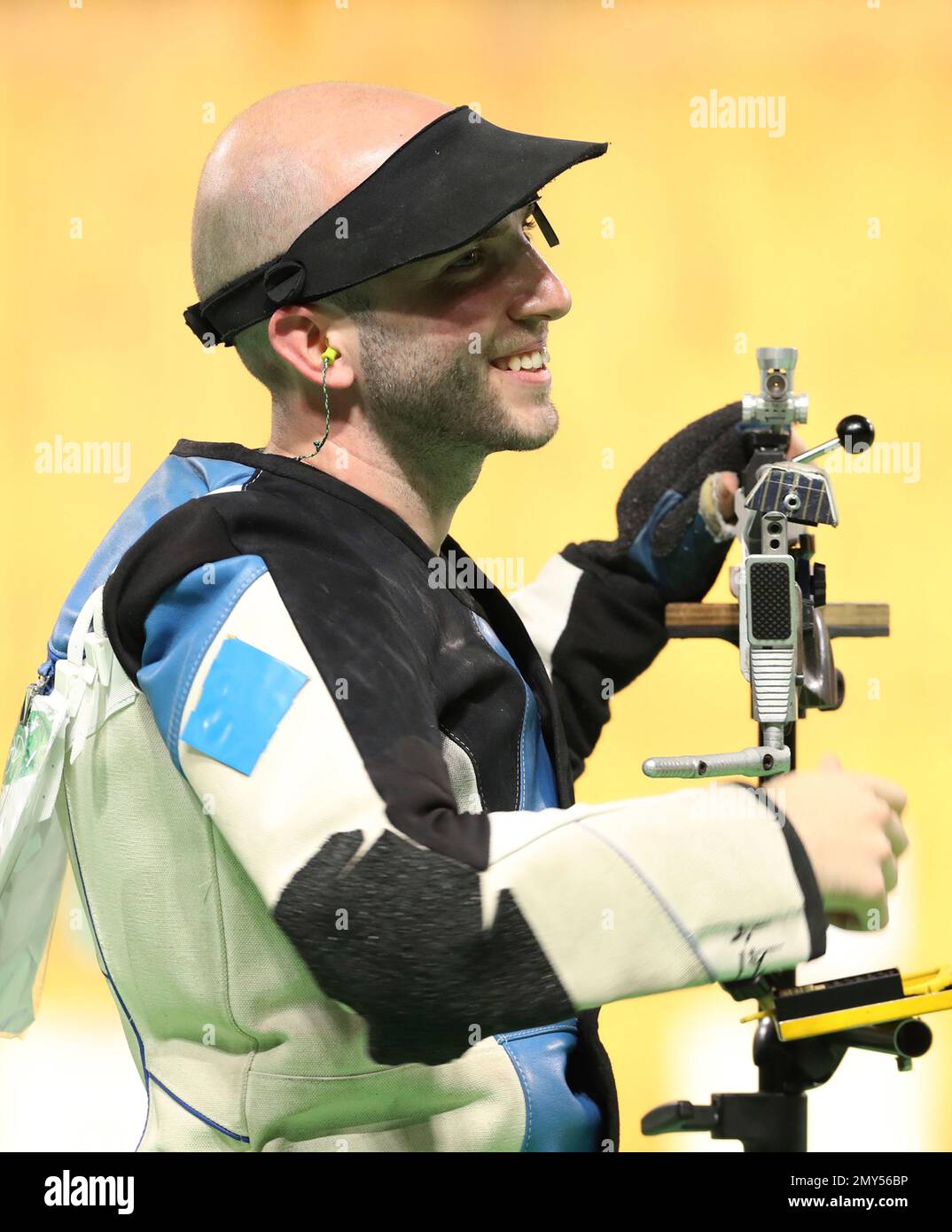 Niccolo Campriani of Italy reacts to secure the gold medal during the ...