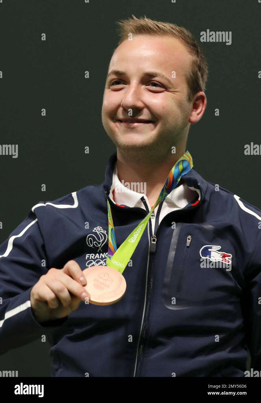 Alexis Raynaud of France celebrates his bronze medal during the award ...