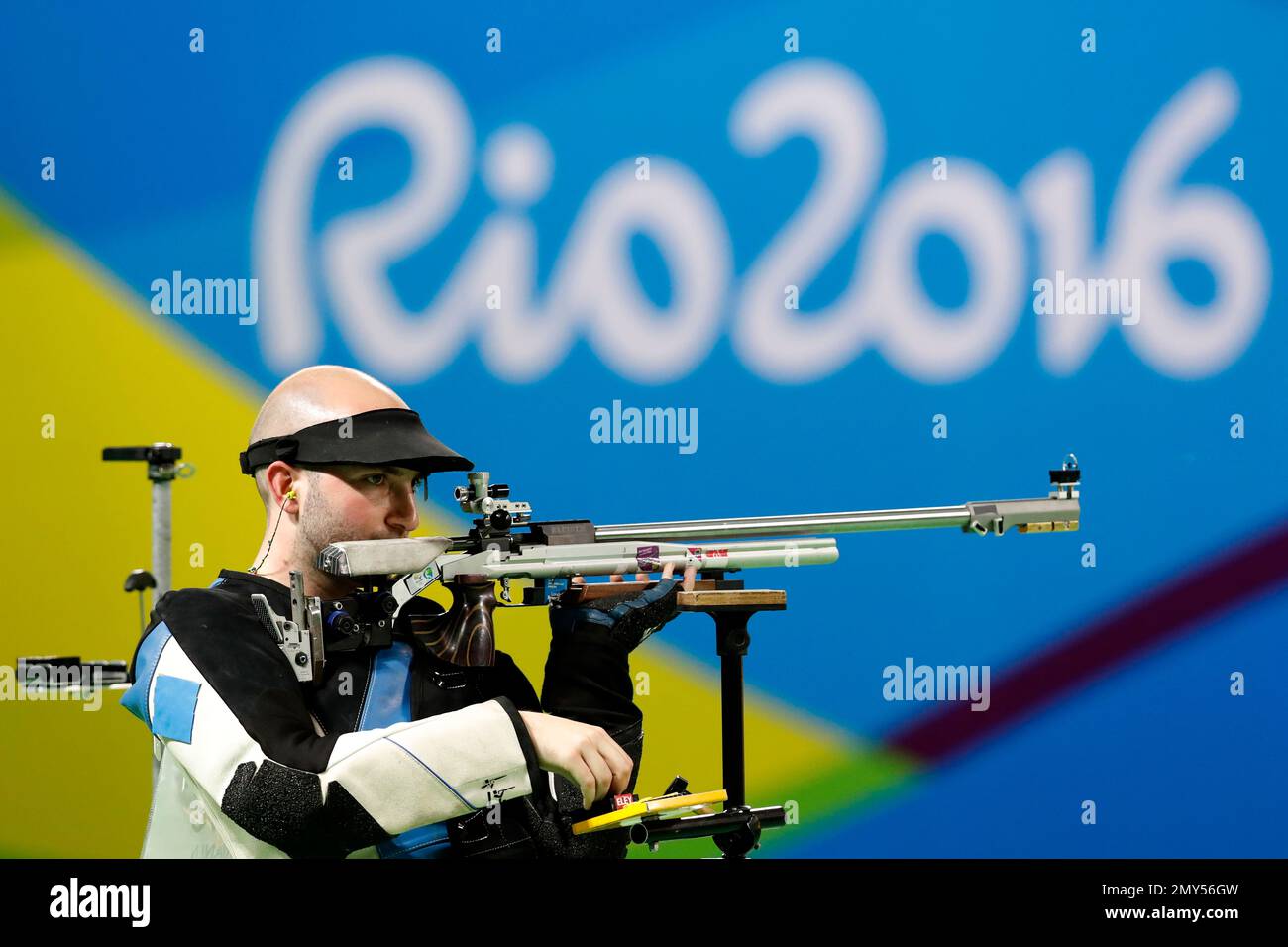 Niccolo Campriani prepares to shoot during the men's 50-meter rifle 3 ...