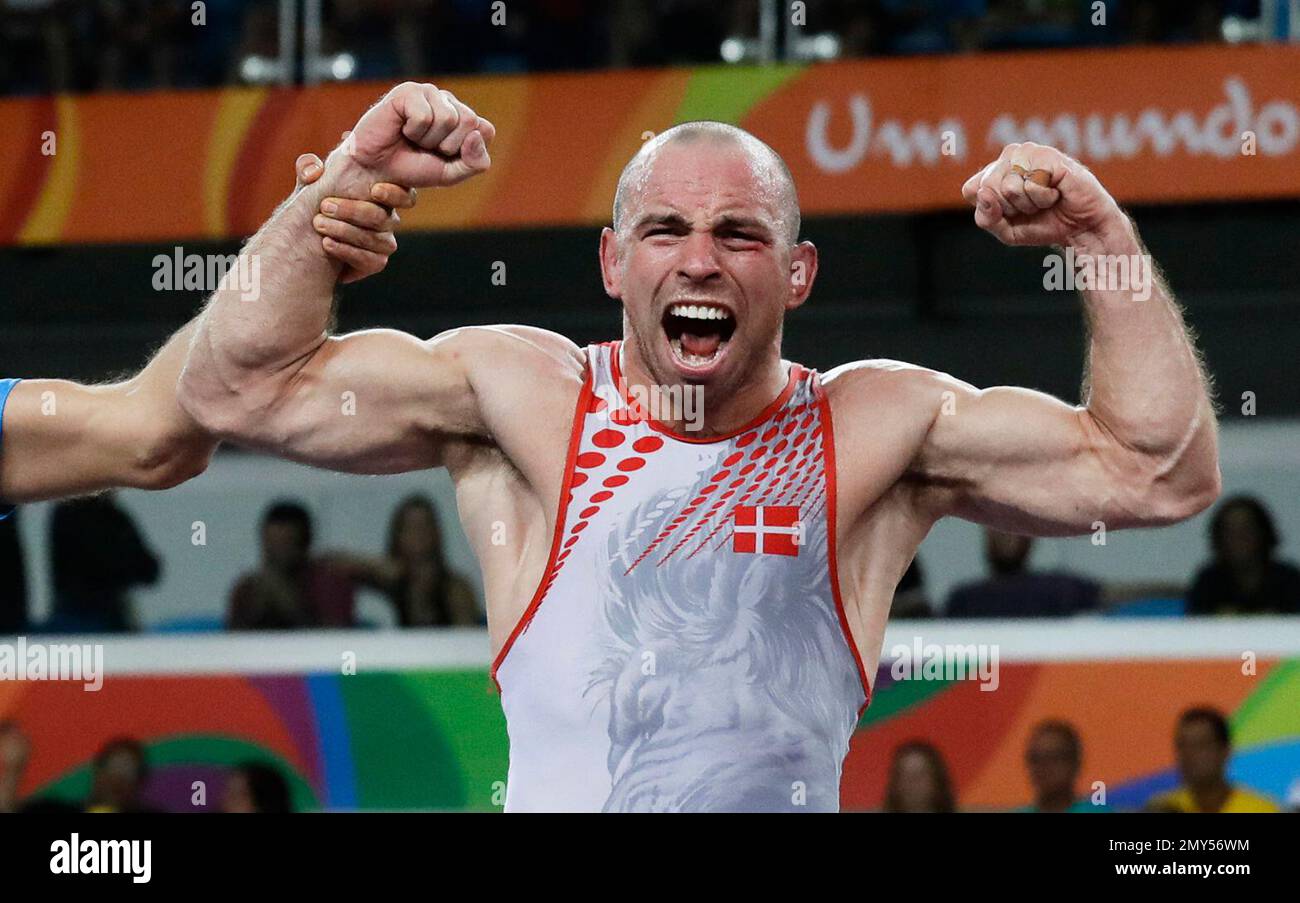 Denmark's Mark Overgaard Madsen reacts after winning against Hungary's ...