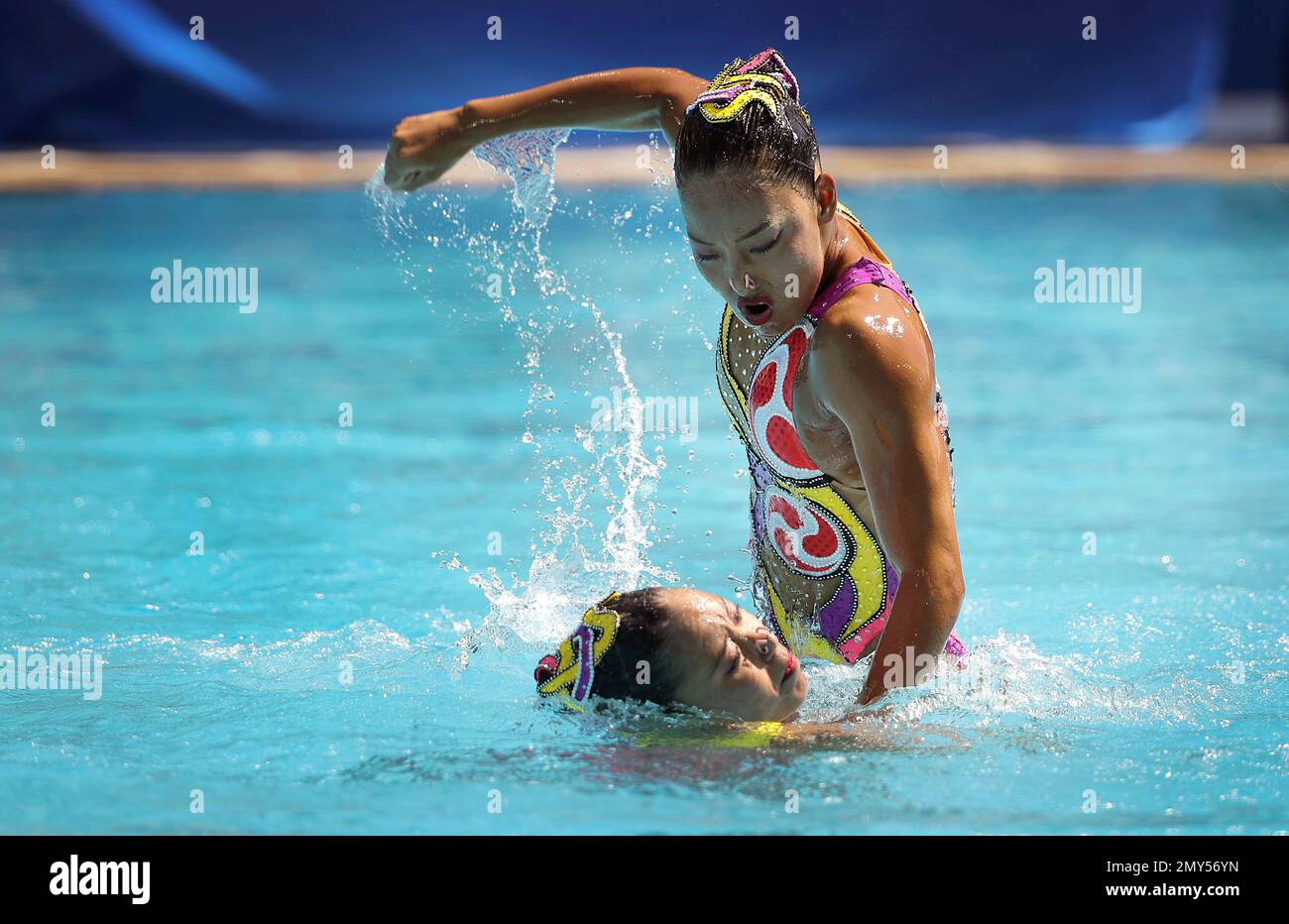 Japan's Yukiko Inui and Risako Mitsui compete during the synchronized ...