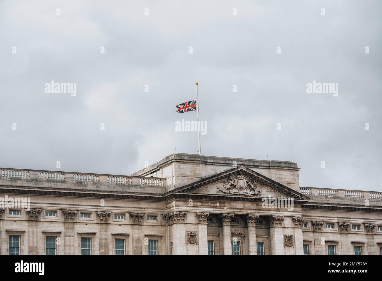 England mourning, half raised flag Union Jack on Buckingham Palace ...