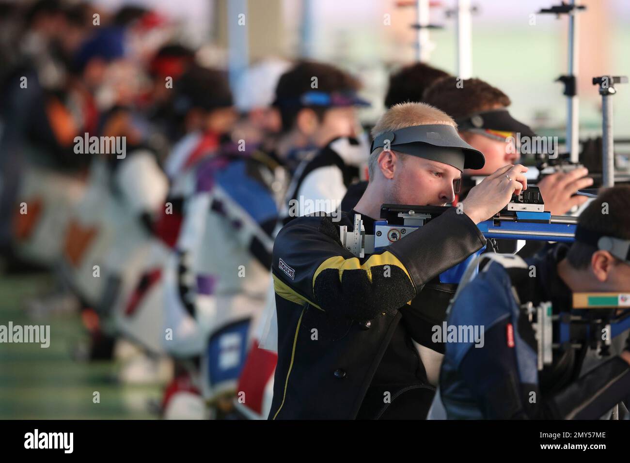 Athletes compete during the men's 50 meter rifle 3 positions ...