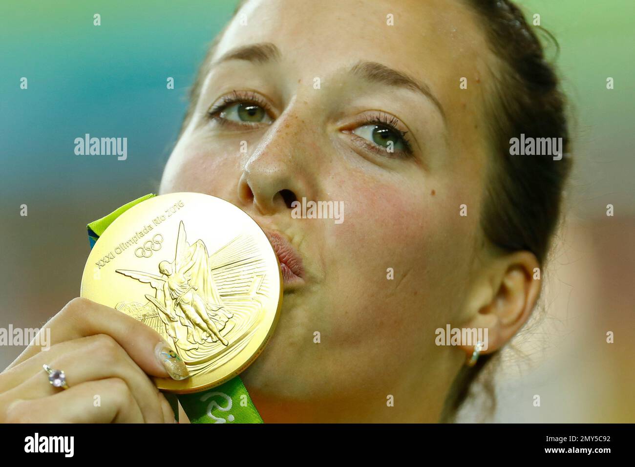 Elis Ligtlee of the Netherlands kisses her gold medal during the podium ...