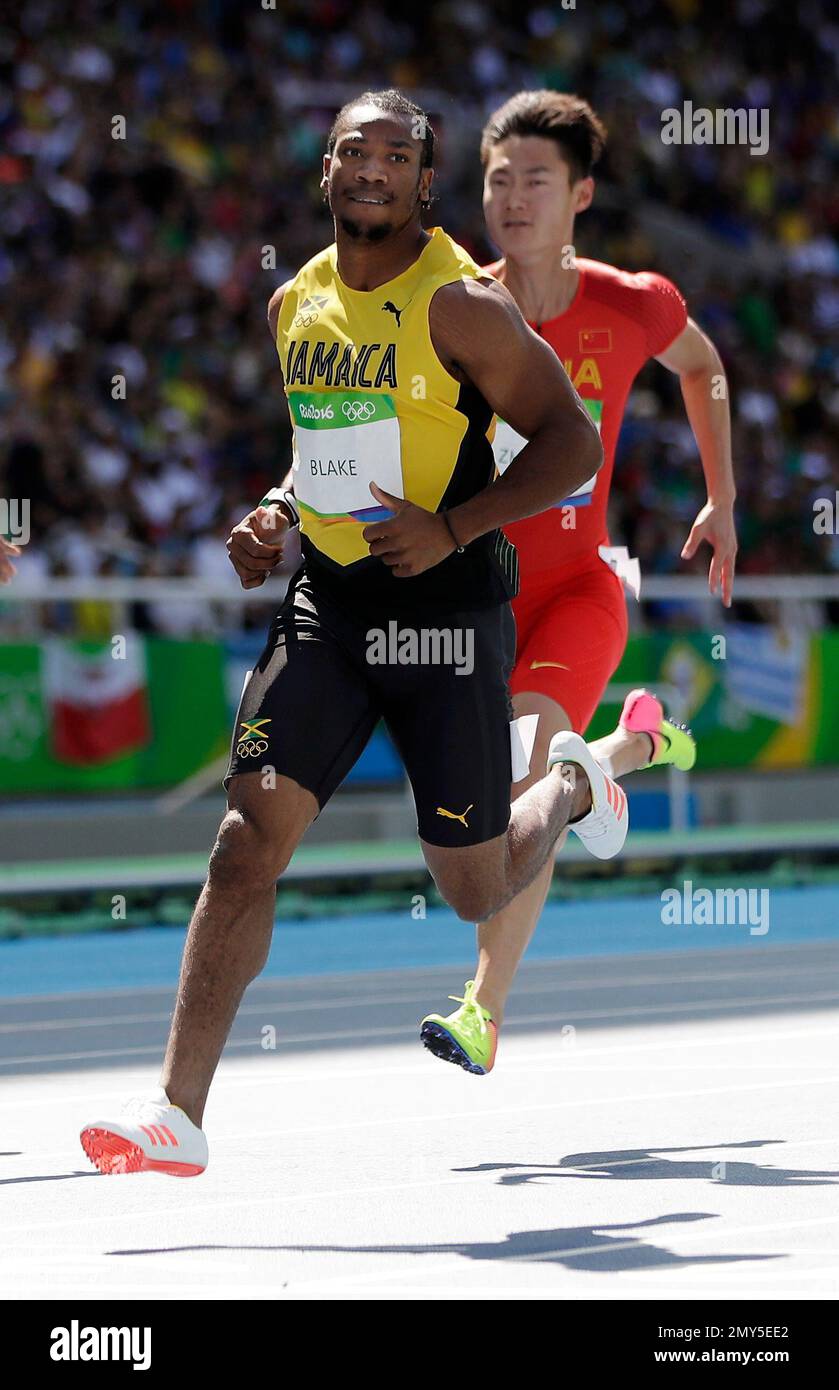 Jamaica's Yohan Blake crosses the line of a men's 100-meter first round ...