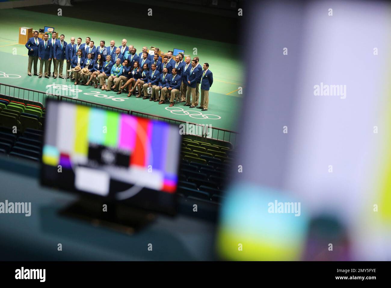 Event officials gather to take a family photo at the venue prior to the ...