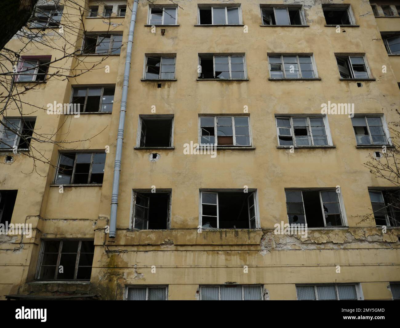 building, residential building empty broken windows concept of disaster ...
