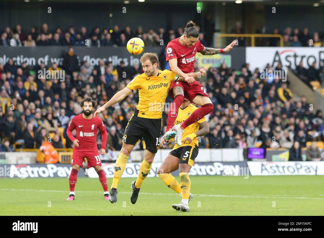 Wolverhampton, UK. 04th Feb, 2023. Darwin Nunez of Liverpool (r) jumps ...
