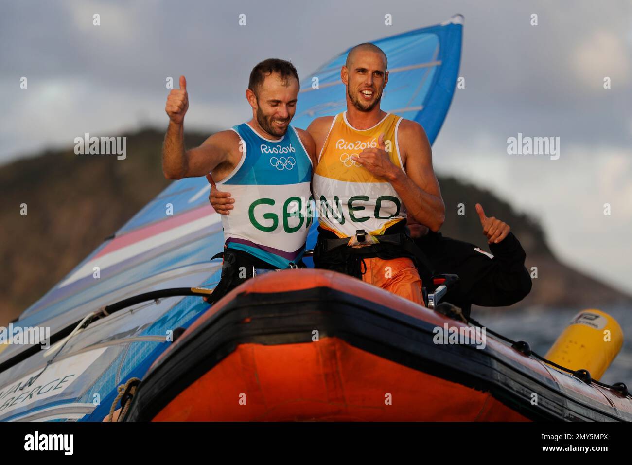 Dorian van Rijsselberghe, from Netherlands, and Great Britain's Nick ...
