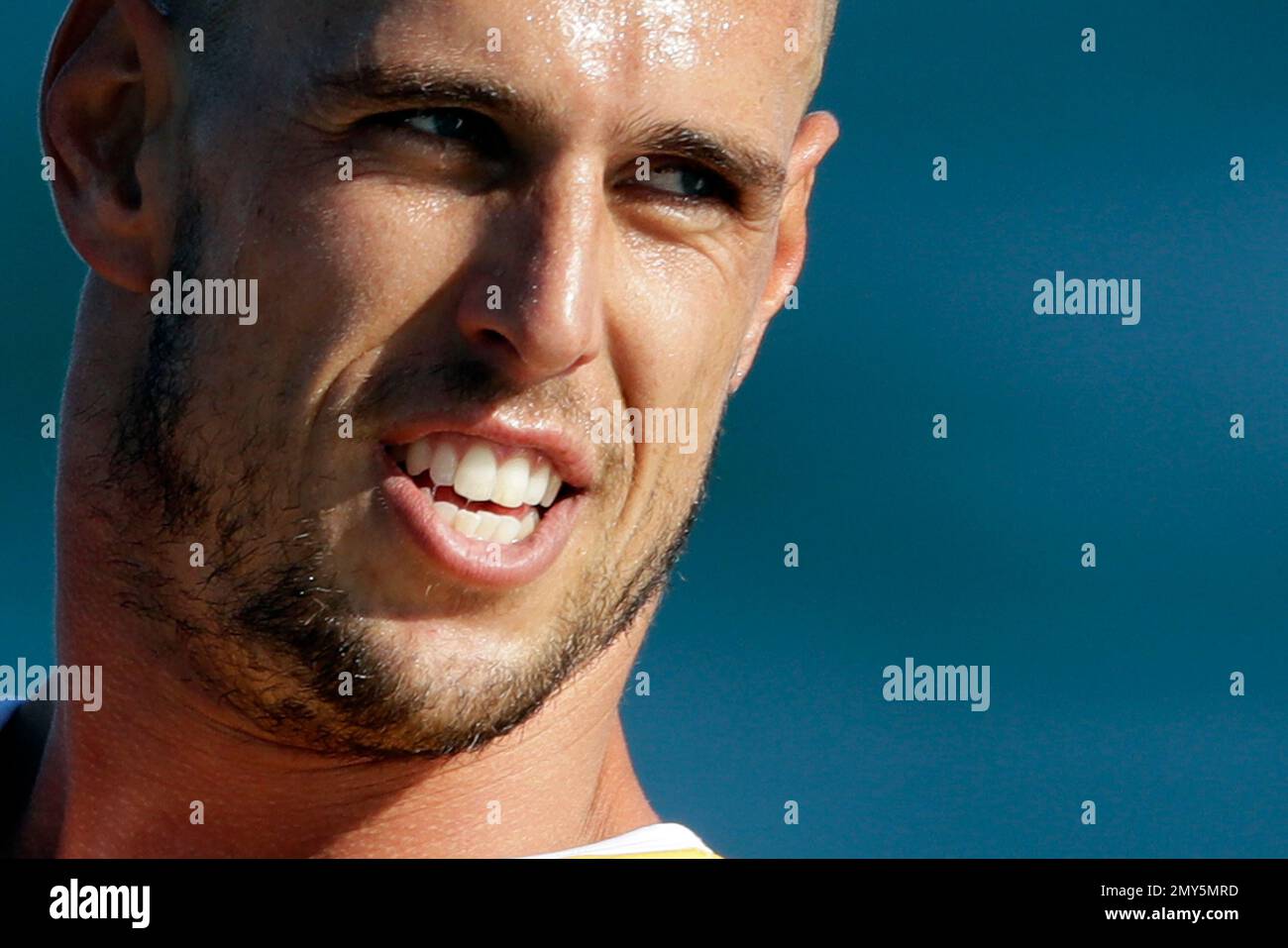 Netherlands' Dorian van Rijsselberghe smiles after crossing the finish ...