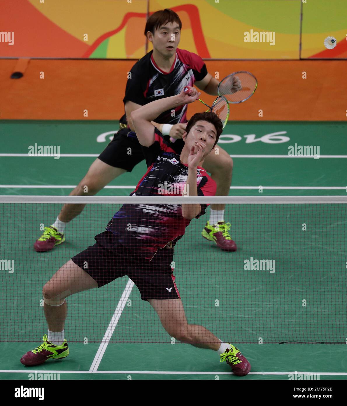 South Korea's Kim Gi-jung, front and Kim Sa-rang return a shot to Great ...