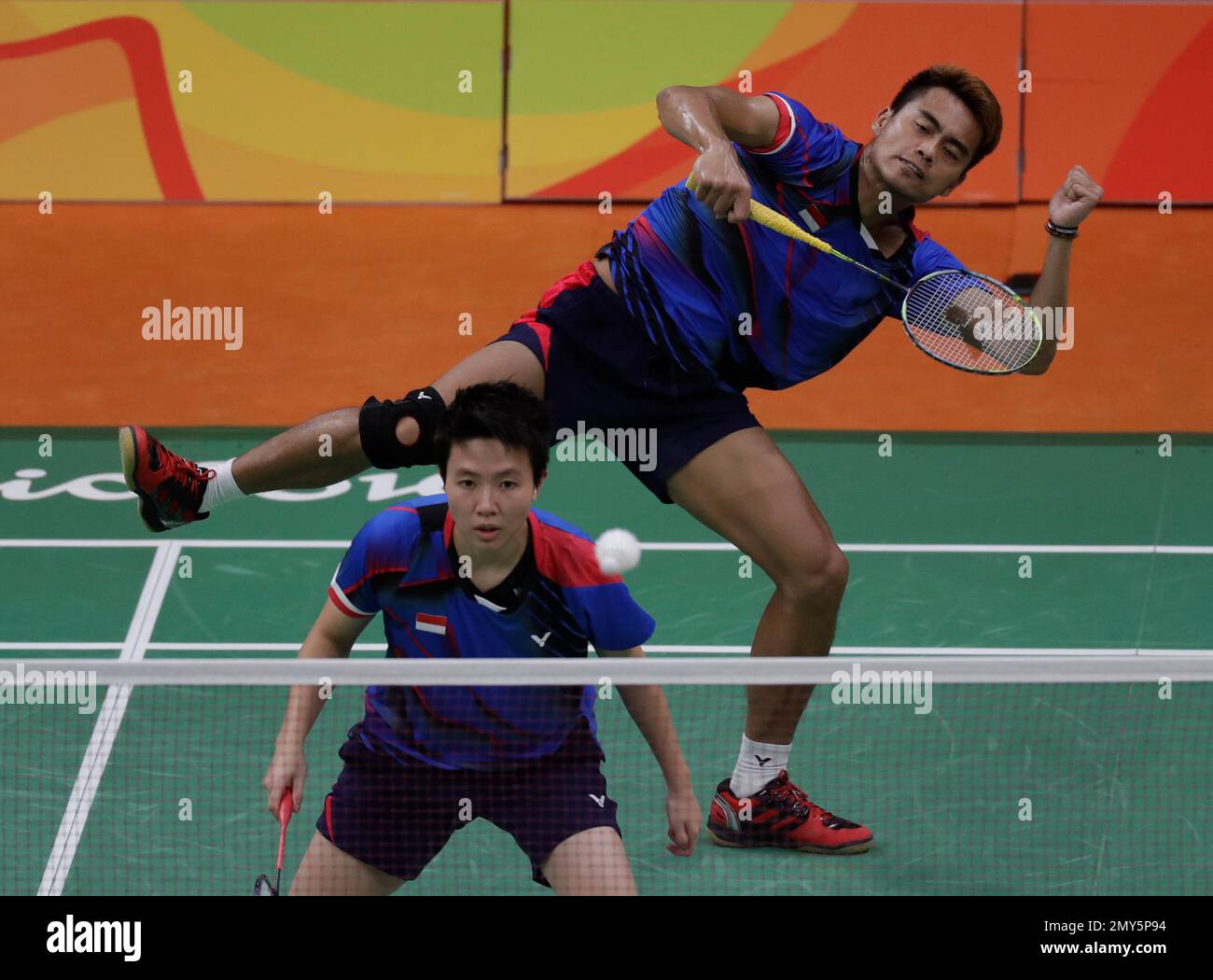 Indonesia's Tontowi Ahmad, back, and Liliyana Natsir return a shot to ...