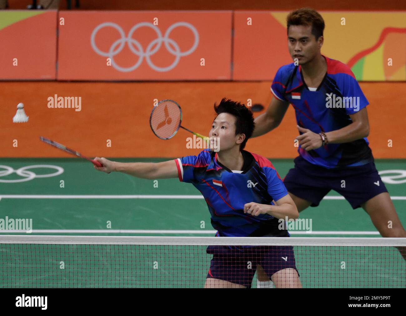 Indonesia's Tontowi Ahmad, right, and Liliyana Natsir return a shot to ...