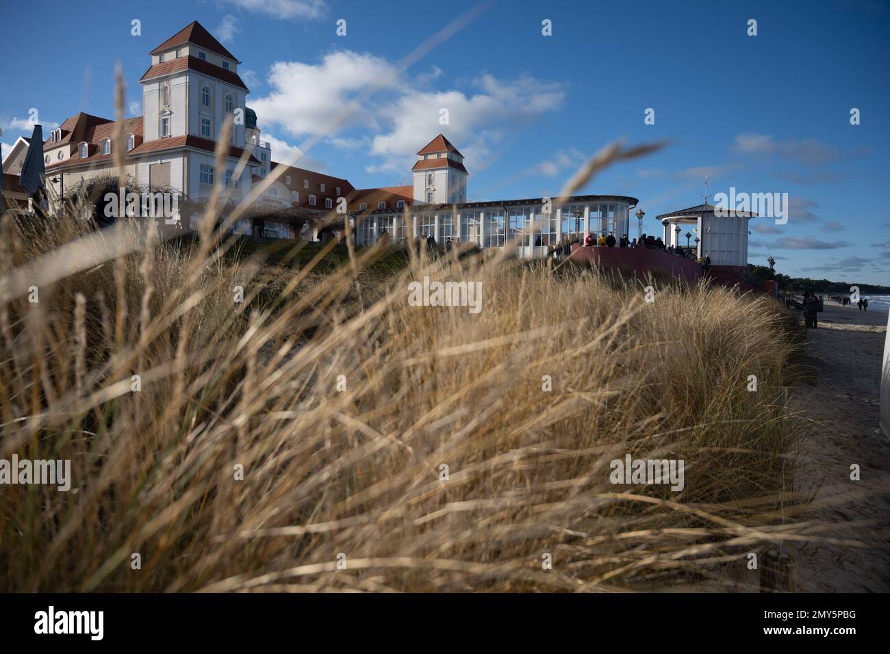 Binz, Germany. 04th Feb, 2023. Tourists walk through the dunes on the ...