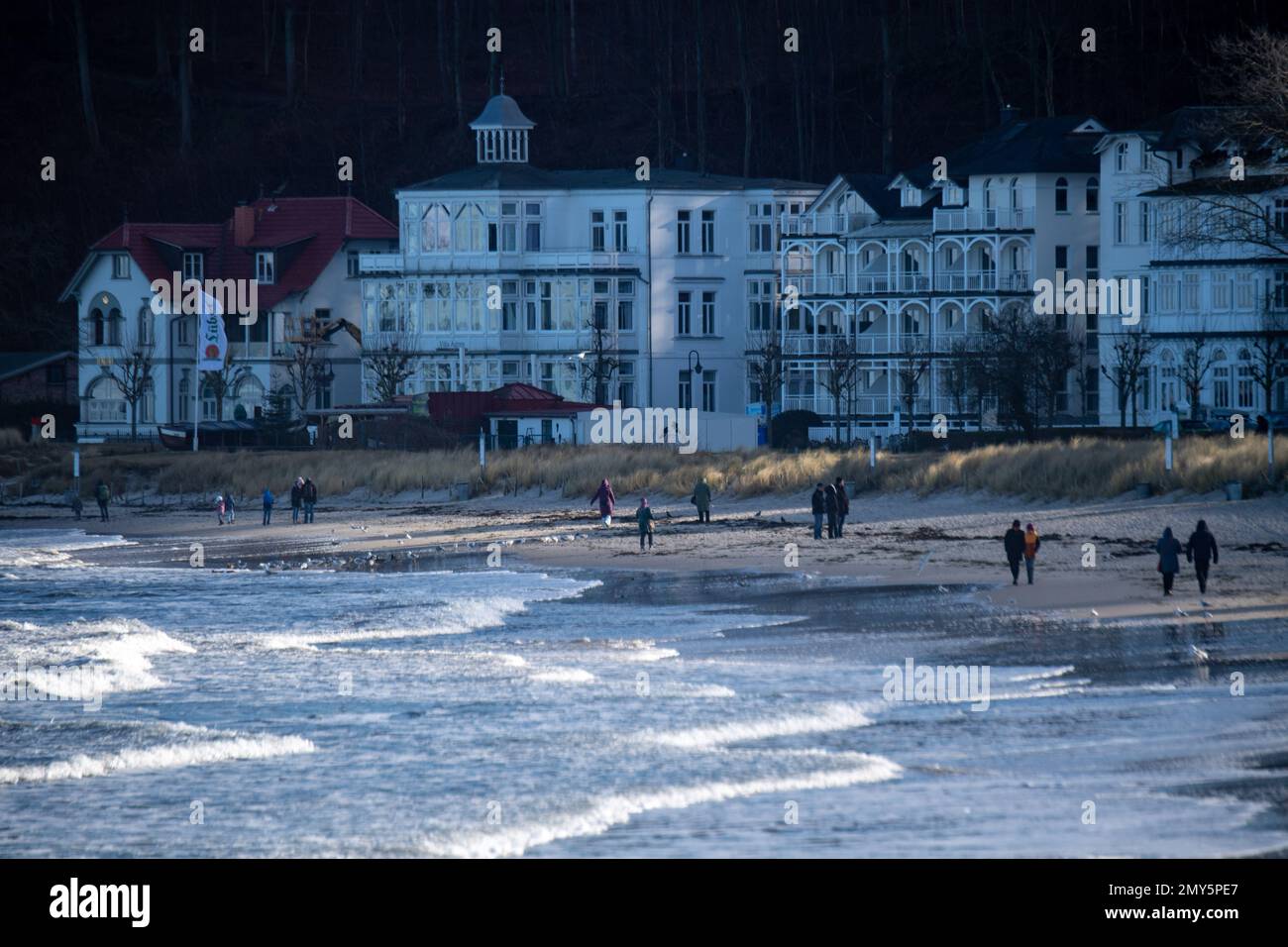 Binz, Germany. 04th Feb, 2023. Tourists walk on the beach of the Baltic ...