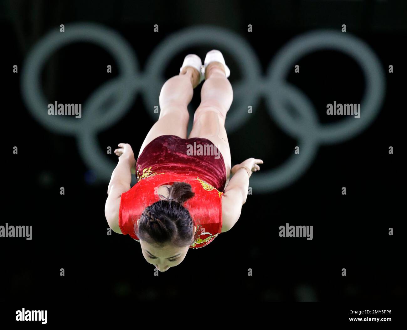 China's He Wenna performs during the women's trampoline qualification ...