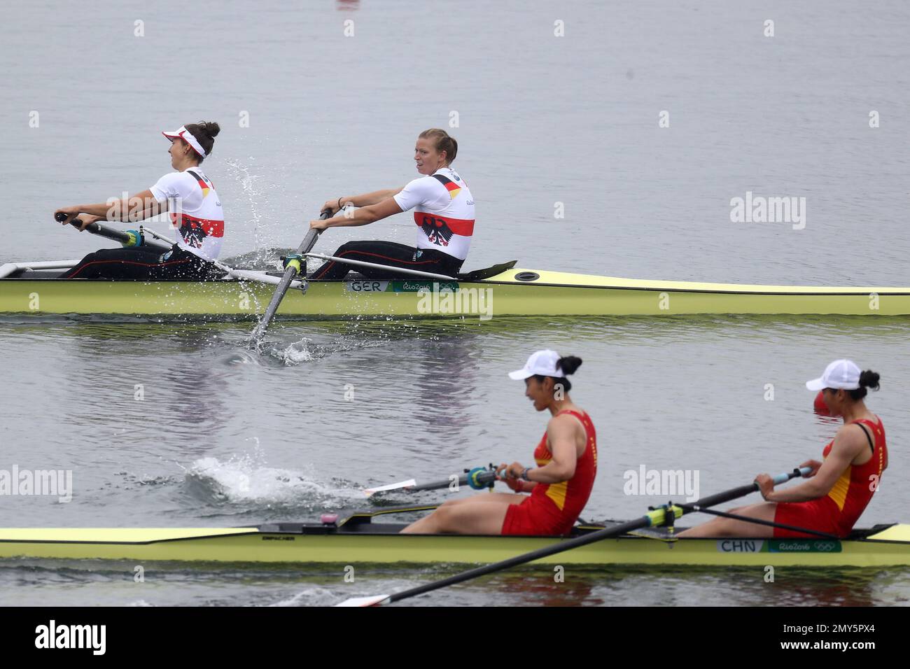 Kerstin Hartmann and Kathrin Marchand of Germany, top, compete in the ...