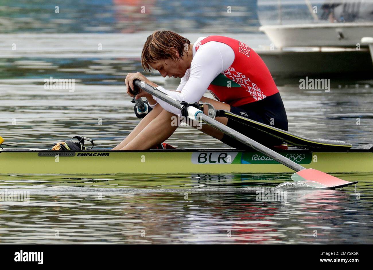 Ekaterina Karsten, of Belarus, rests after competing in the women's ...