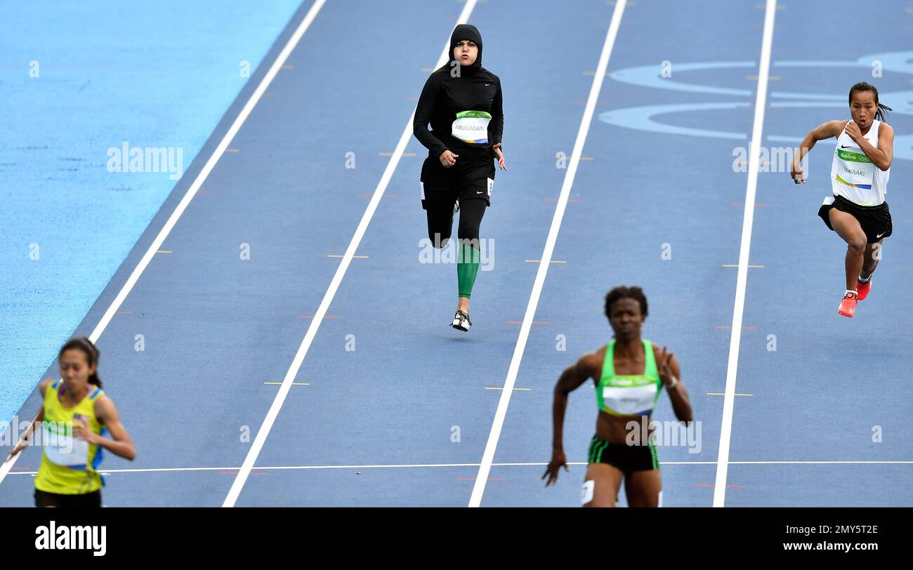 Saudi Arabia's Kariman Abuljadayel competes in a women's 100-meter heat ...